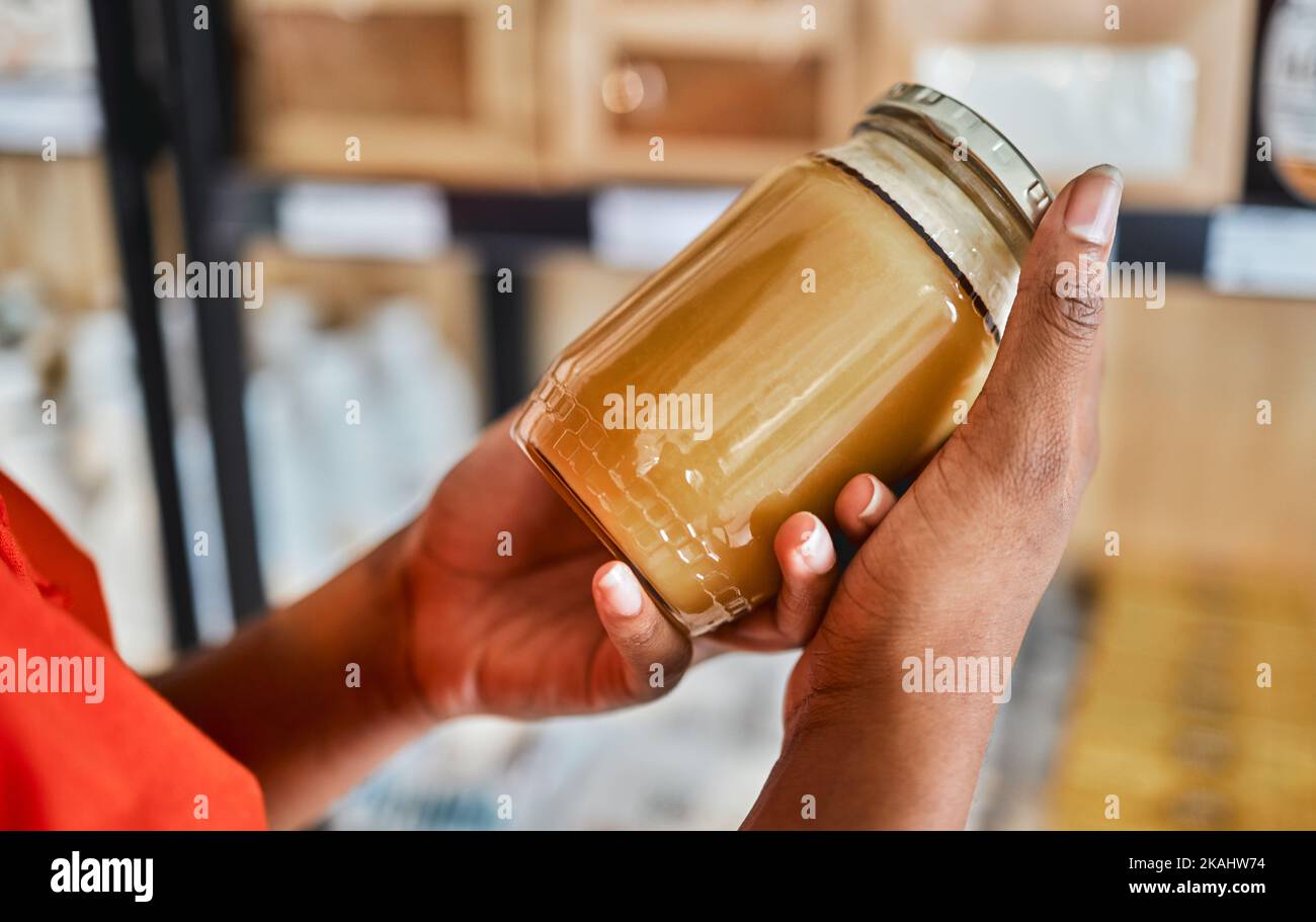 Shopping, peanut butter in hands and grocery store customer decision ...