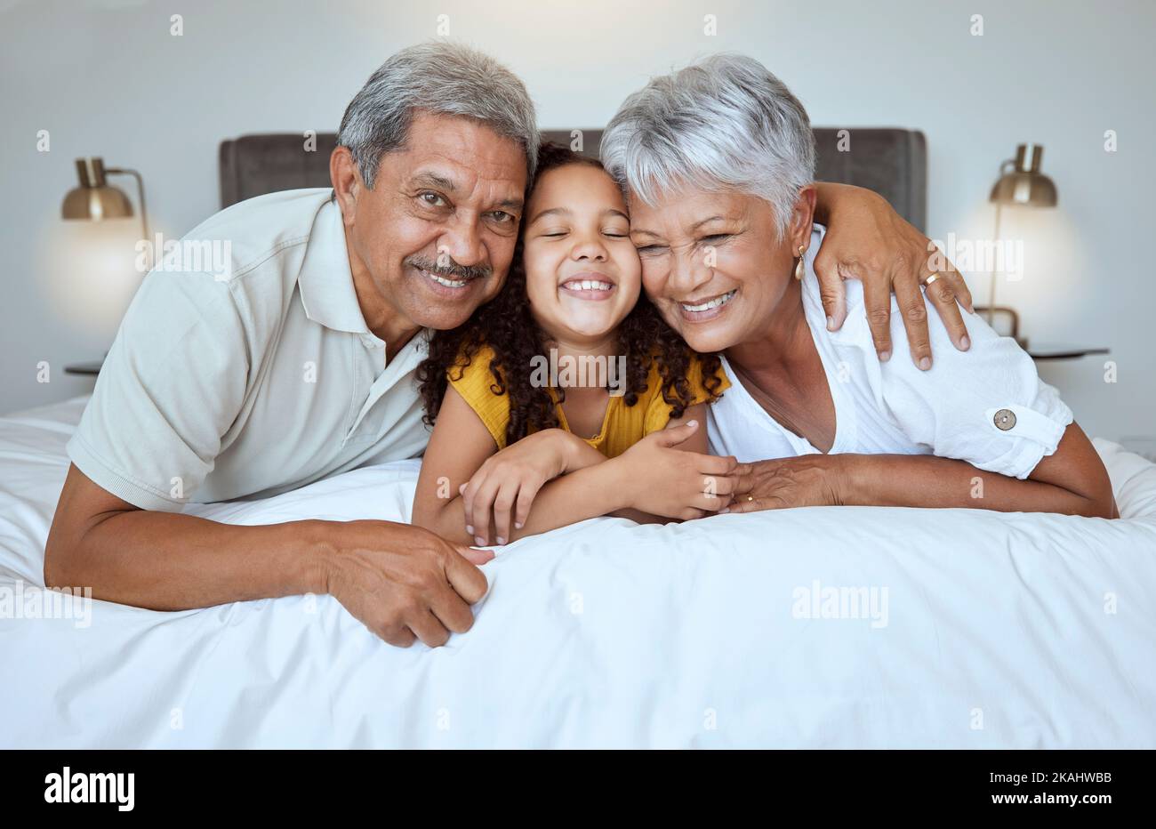 Love, bonding and mature people with child bonding while relaxing on ...