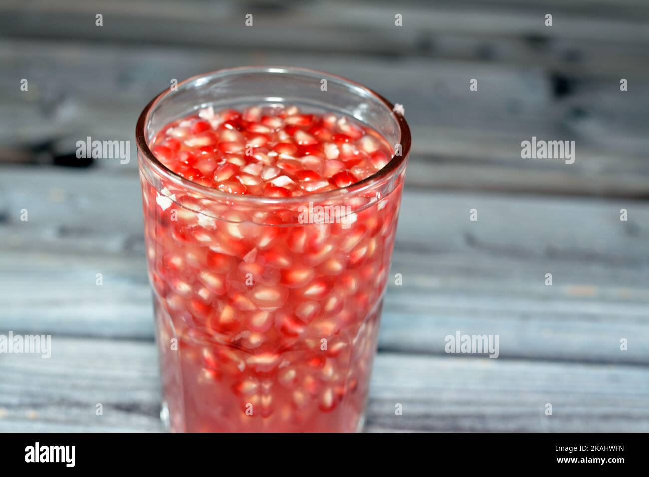 The pomegranate (Punica granatum), a fruit-bearing deciduous shrub in ...