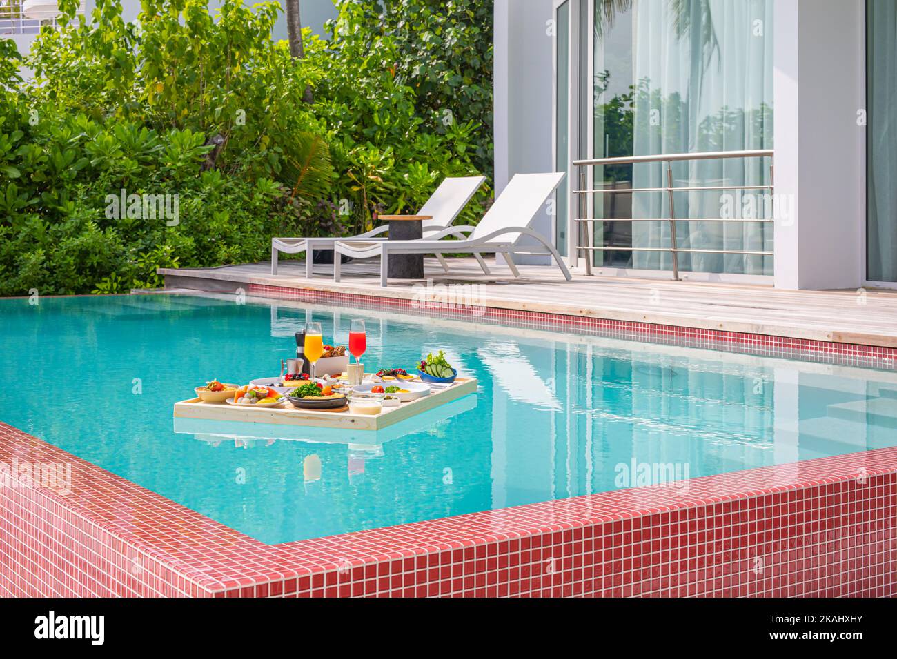 Breakfast in swimming pool, floating breakfast in luxurious tropical ...