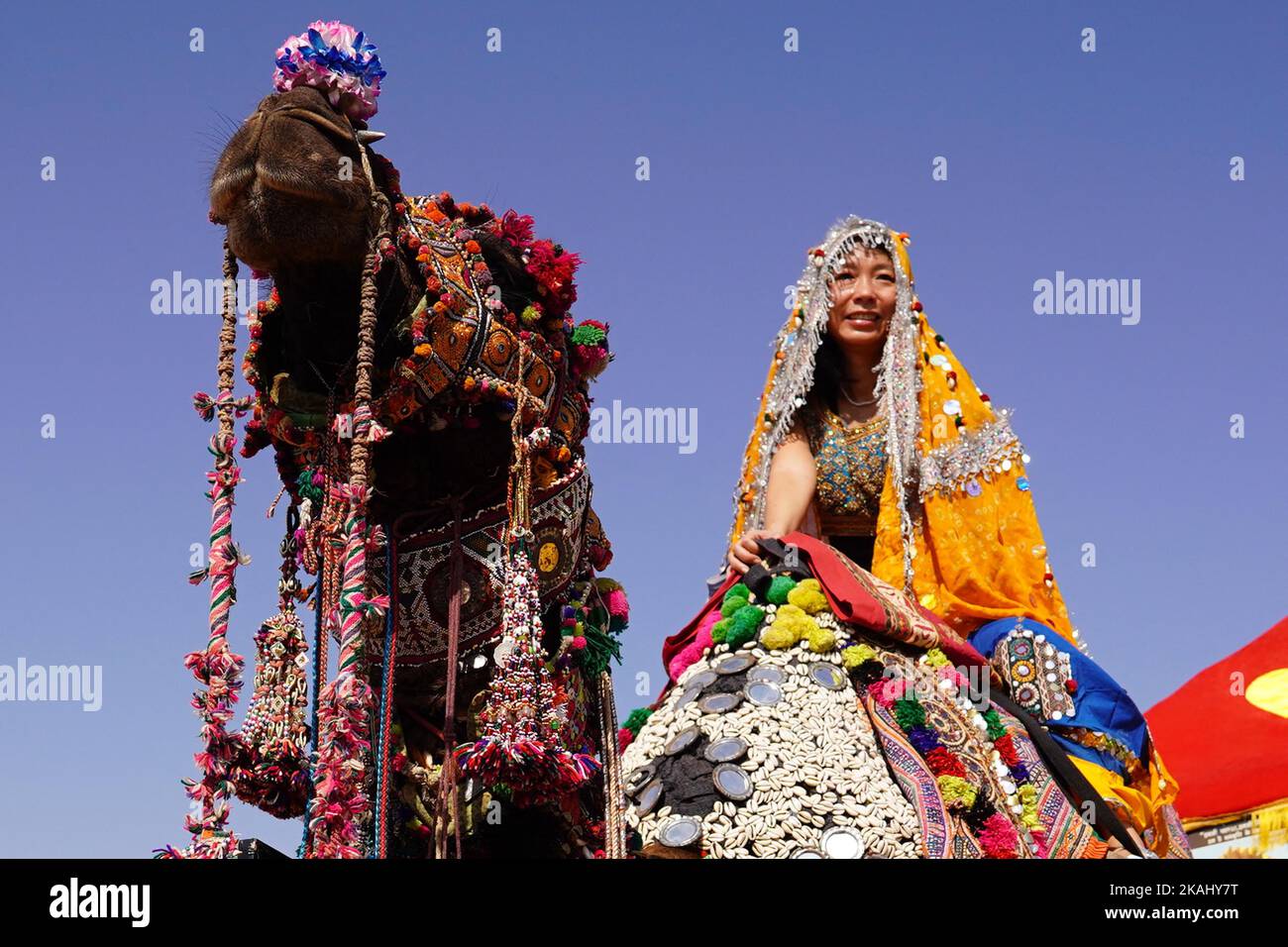 Famous camel decorator Ashok Tak entertains foreign tourists with his ...