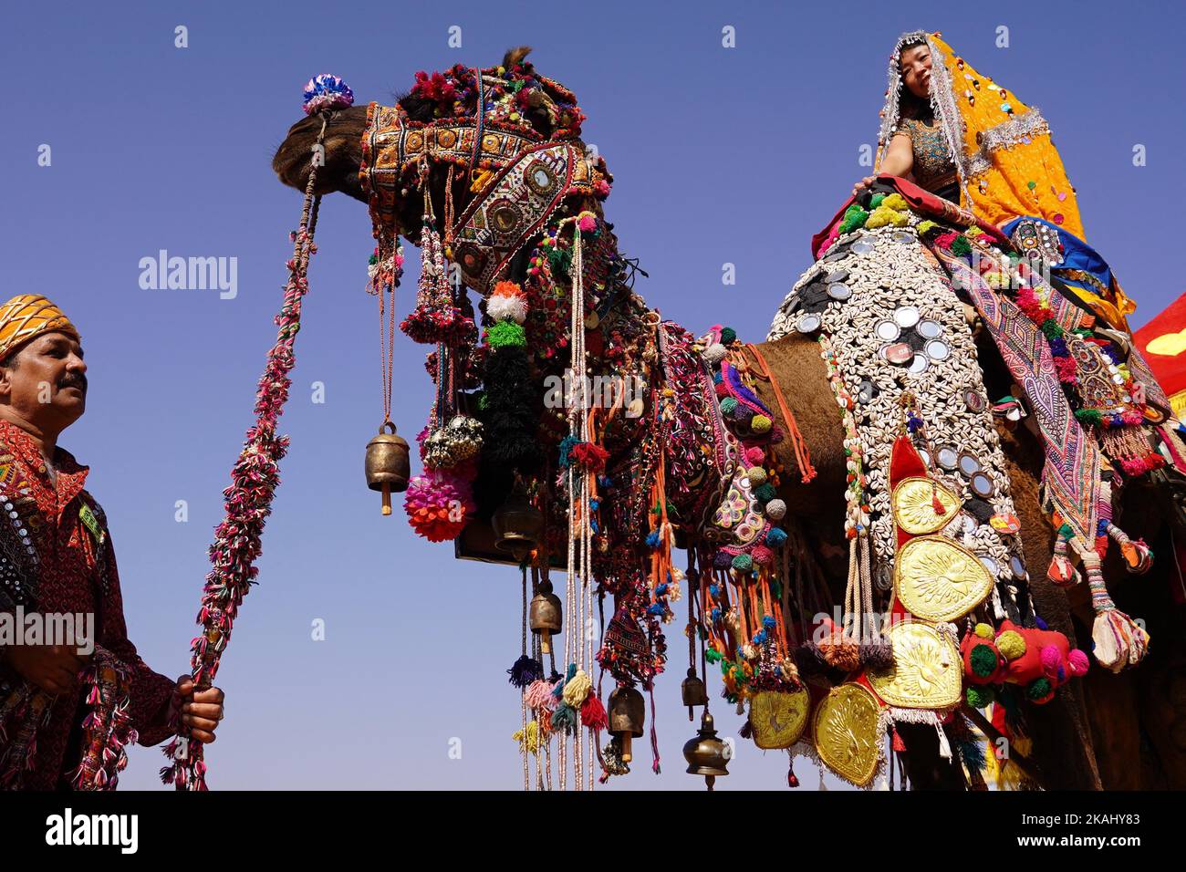 Famous camel decorator Ashok Tak entertains foreign tourists with his ...