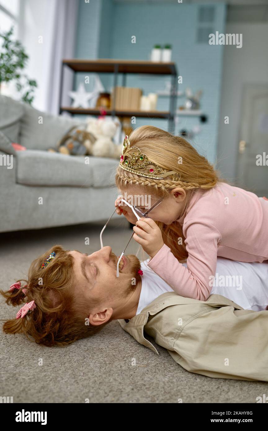 Father and daughter have fun and fool around together Stock Photo - Alamy