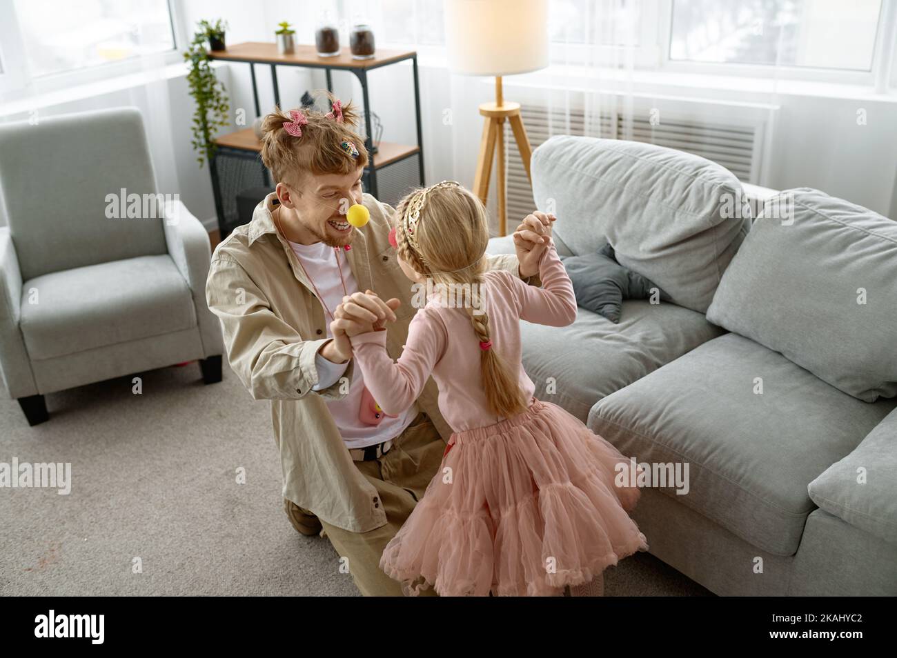 Father and daughter wearing fairies costume having fun Stock Photo - Alamy