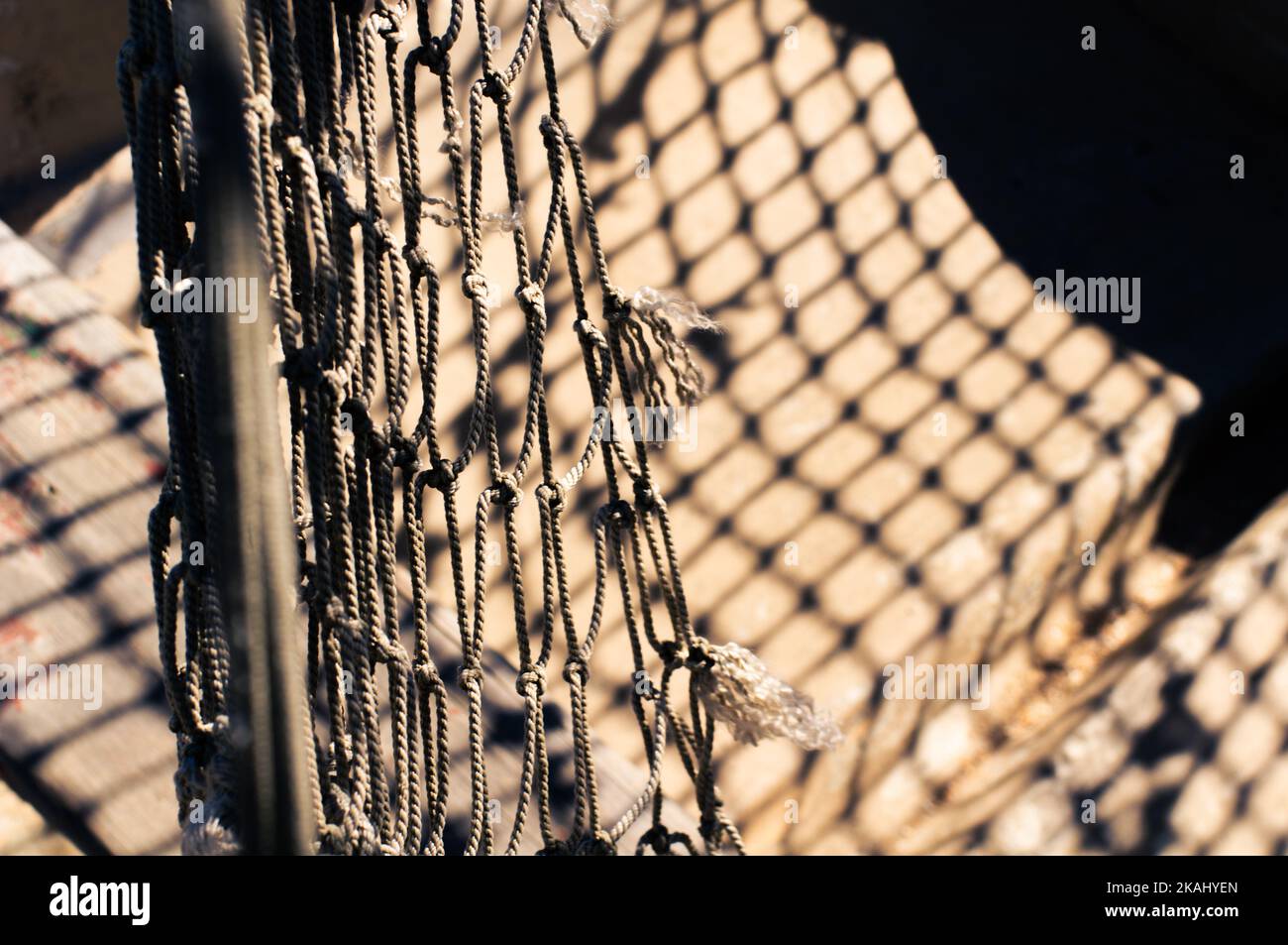 Sea nets are dried in the sun. Front view Stock Photo - Alamy