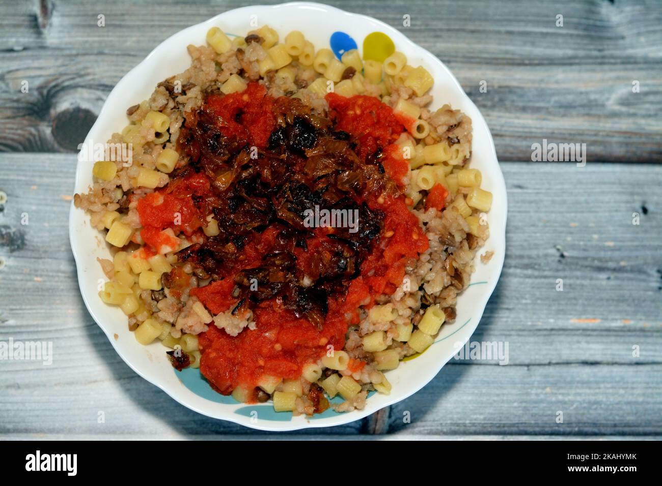 Koshary plate, Egyptian very popular and traditional cuisine of rice ...