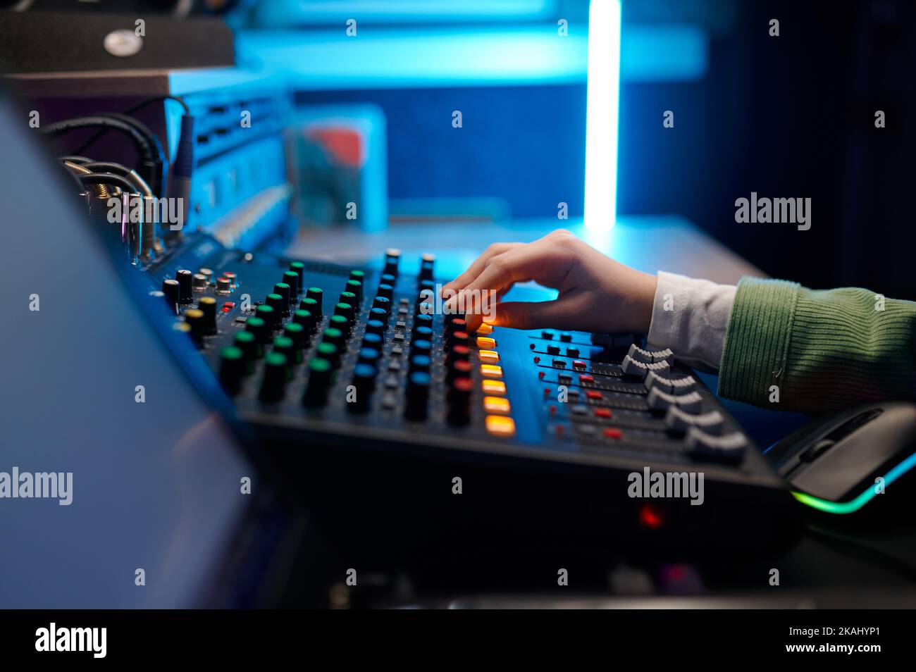 Closeup audio engineer hand on sound mixer control panel Stock Photo ...