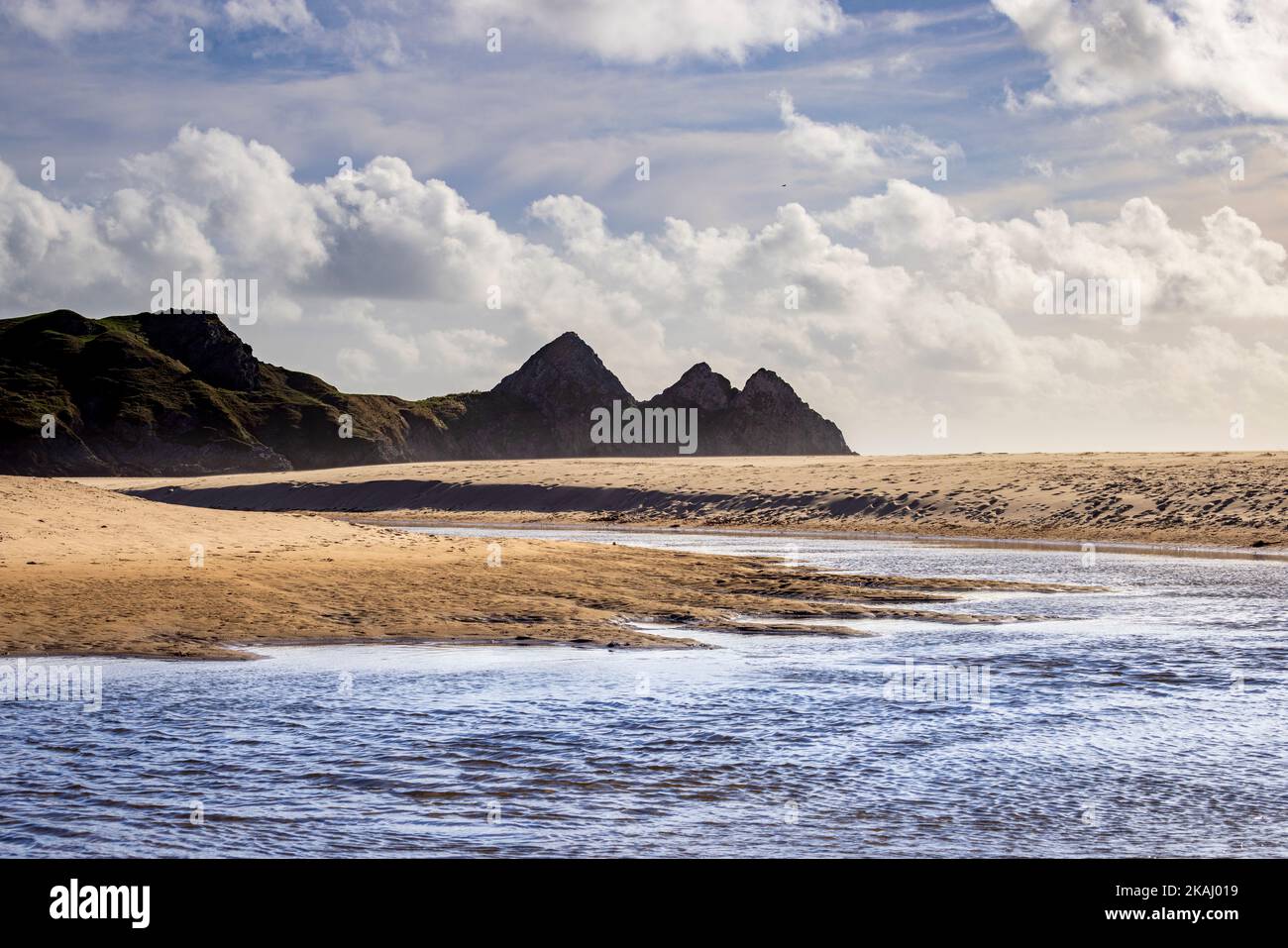 Pennard Pill flowing into Three Cliffs Bay, Gower Peninsula, Wales ...