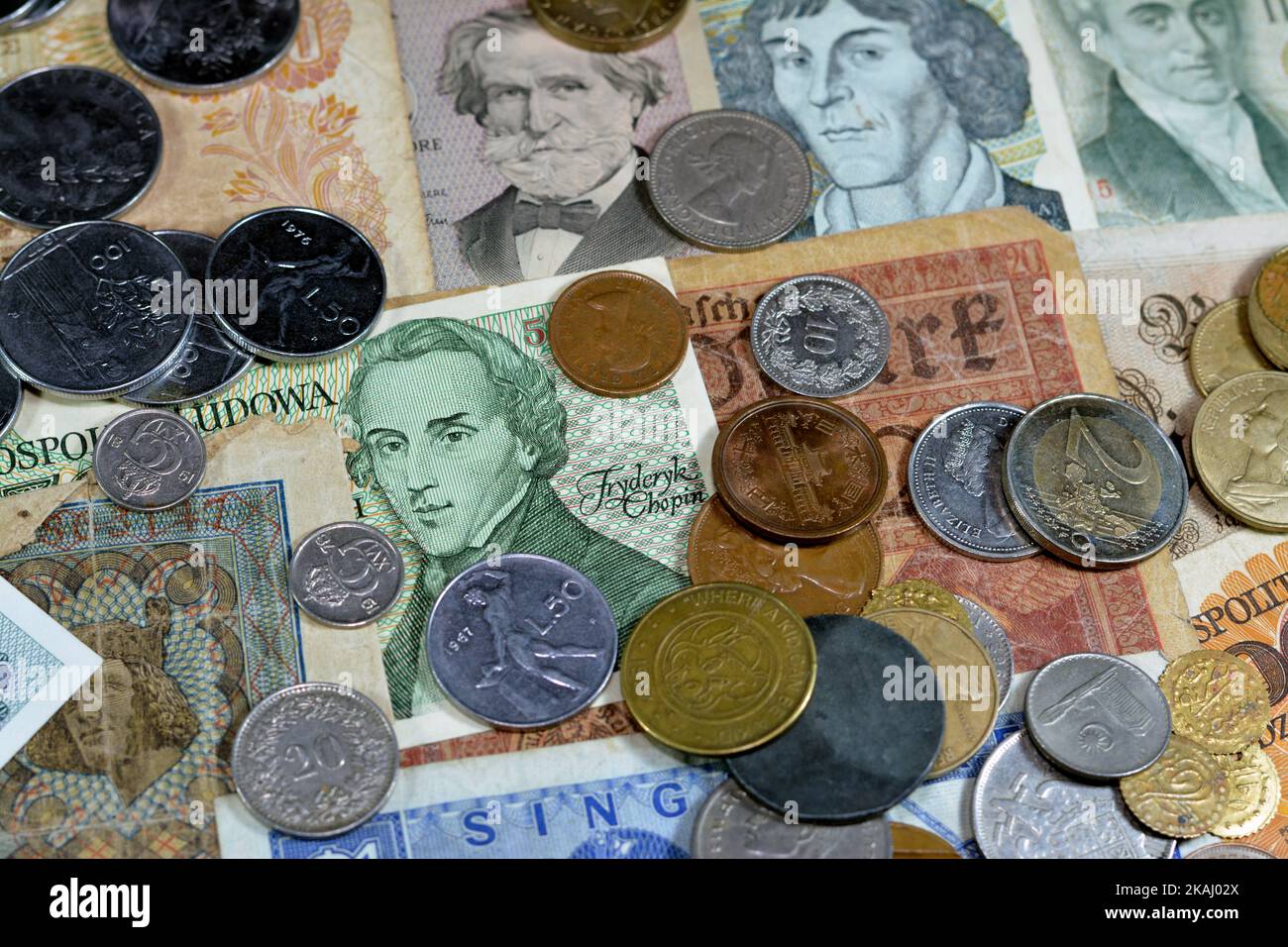 Background of old cash money banknotes and coins from different ...