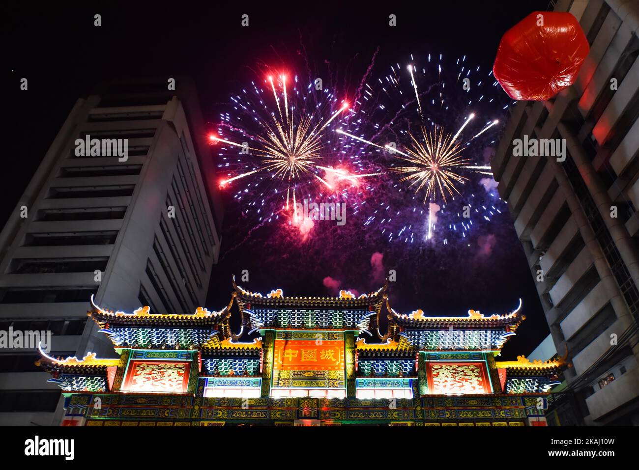 Fireworks illuminate the sky above the Chinatown friendship arch, the ...