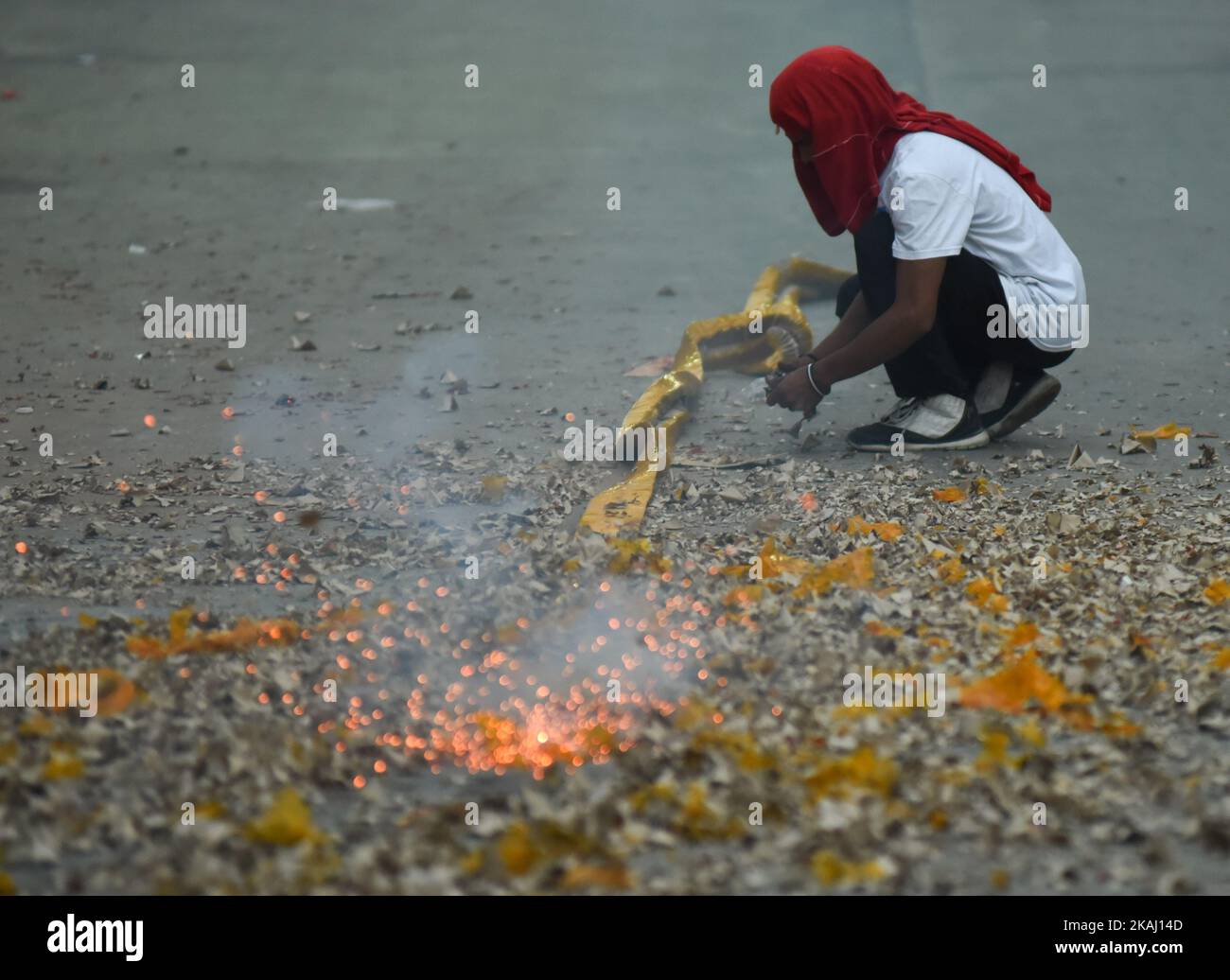 MANILA, Philippines - A man lights firecrackers moments after a lion ...