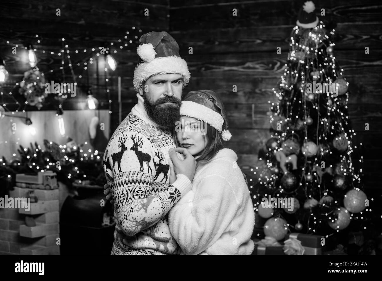 Couple celebrating holidays festive Black and White Stock Photos ...