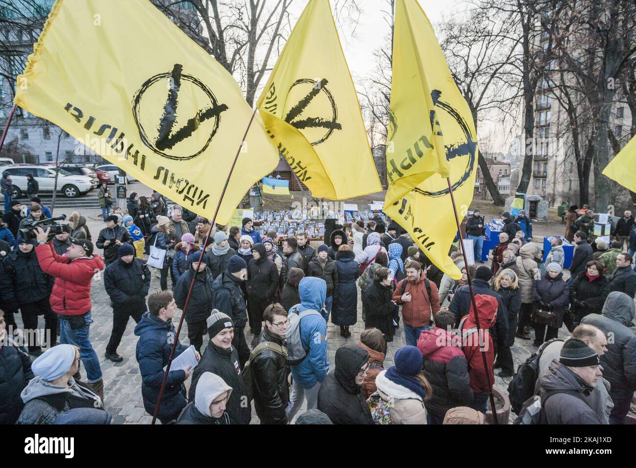 Protesters with flags in a demonstration of ukrainian activists to mark ...