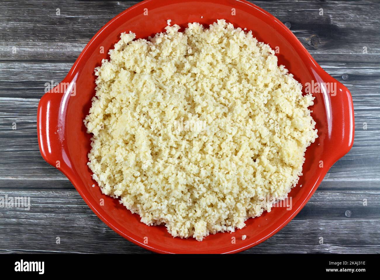 Arabian Cuisine dish of small steamed granules of rolled durum wheat ...