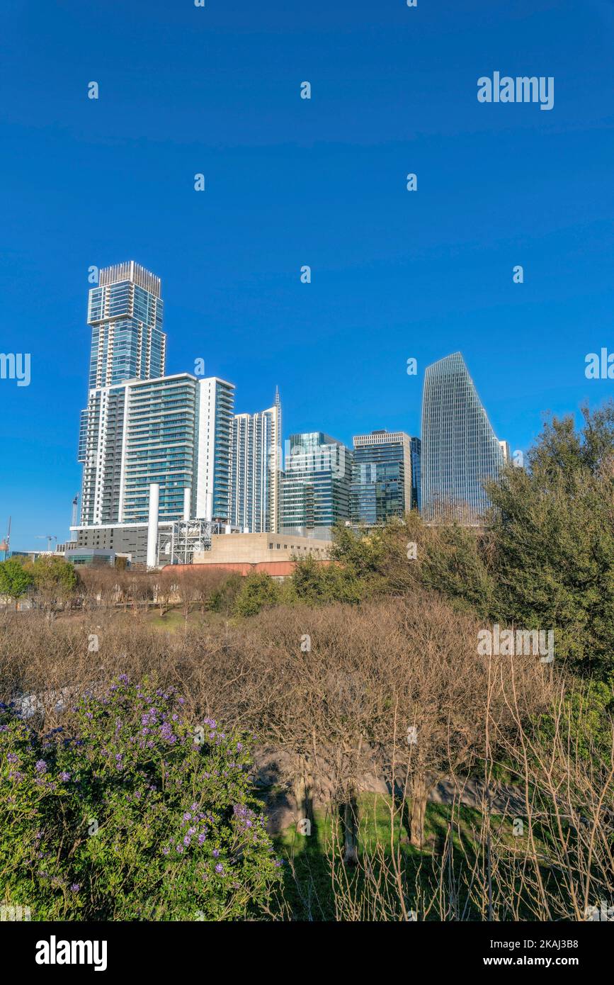 Facade of luxury apartments with modern designs against blue sky ...