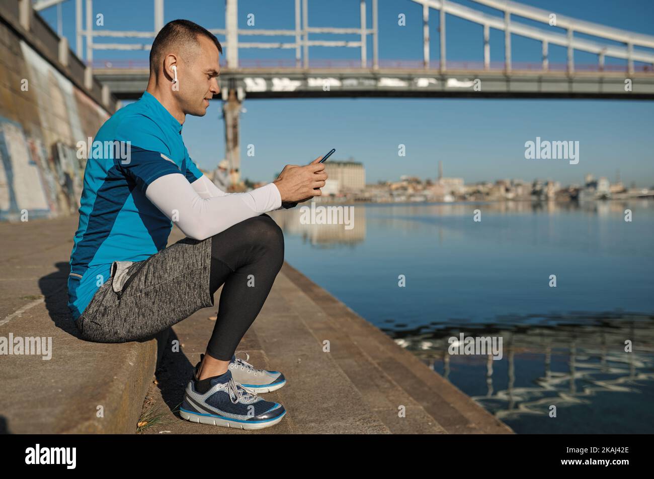 Athletic man rest after running functional workout outdoors Stock Photo ...
