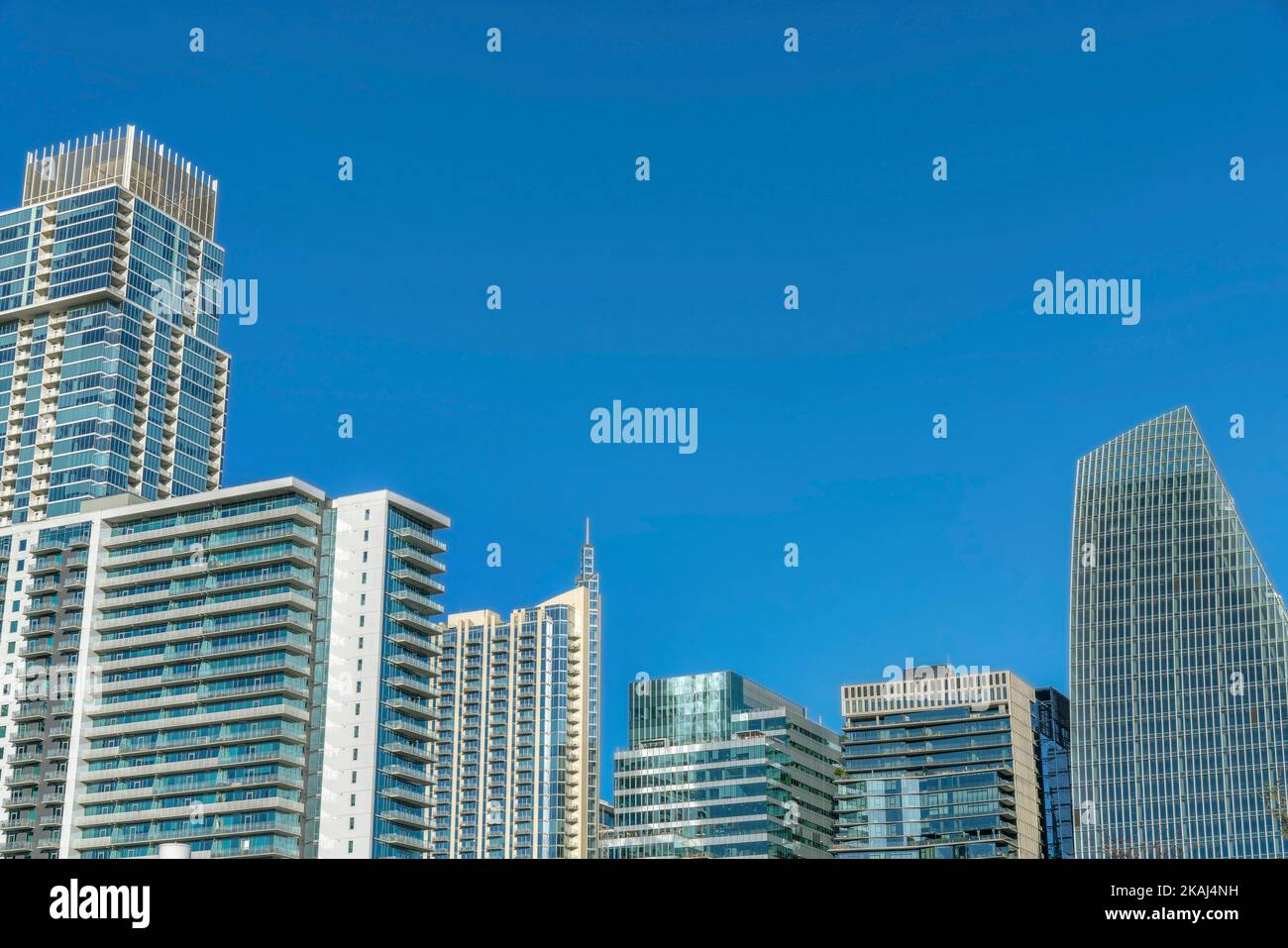 Austin Texas skyline with luxury apartments facade against blue sky ...