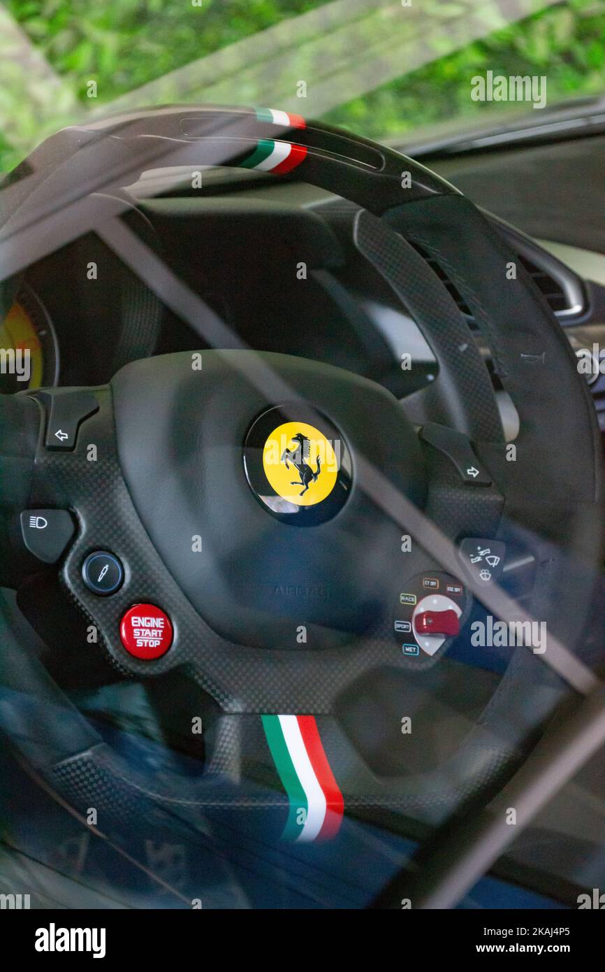 A Ferrari 488 Pista Tailor steering wheel with Italian flag strip on ...