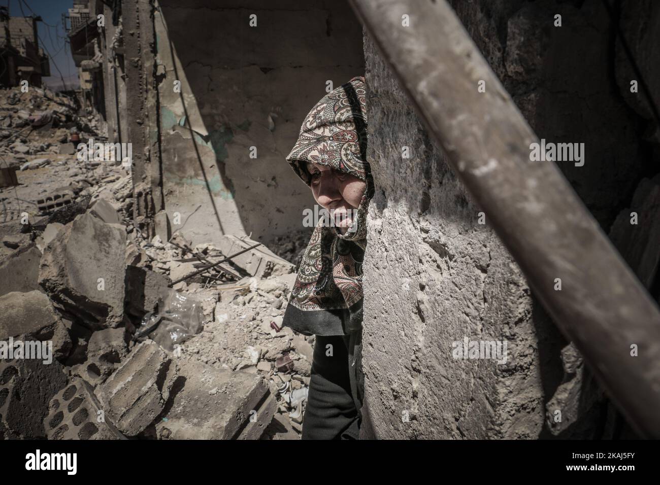 Woman crying in destroyed house hi-res stock photography and images - Alamy