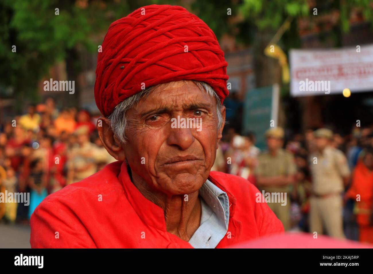 An old man during traditional 'Gangaur' procession on the occasion of ...