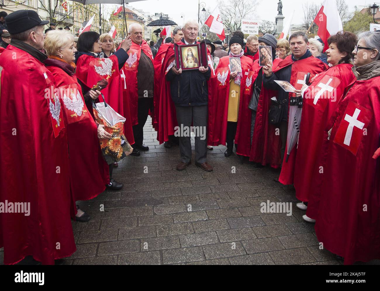 People holding a picture of Jesus on the Sixth anniversary of the ...