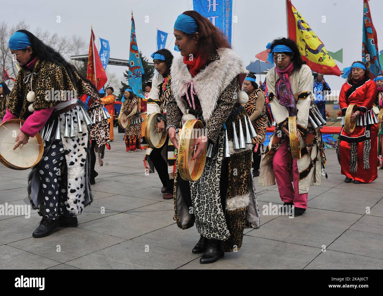 People perform Shaman Dance to pray at the opening of the Kaijiang ...