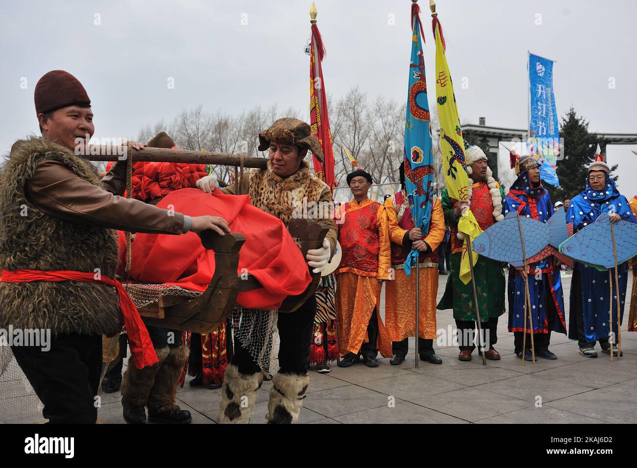 People perform Shaman Dance to pray at the opening of the Kaijiang ...