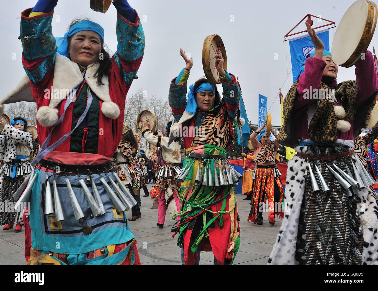 People perform Shaman Dance to pray at the opening of the Kaijiang ...