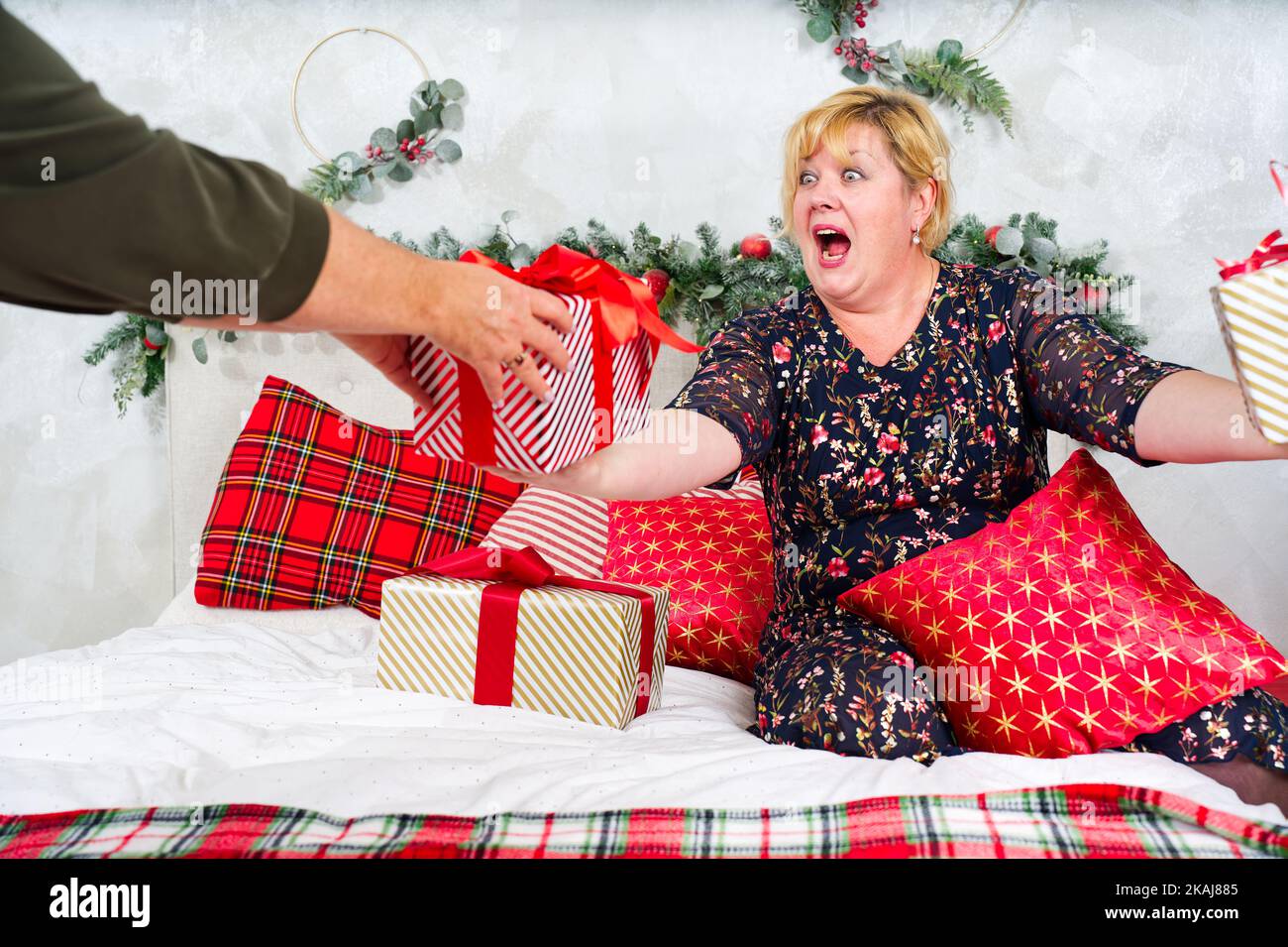 christmas, new year, holidays concept. Happy Woman getting gift box as ...