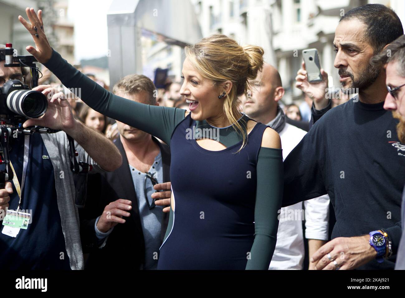 Blake Lively, signs autographs as she exits the Grand Hyatt Cannes 2016 ...