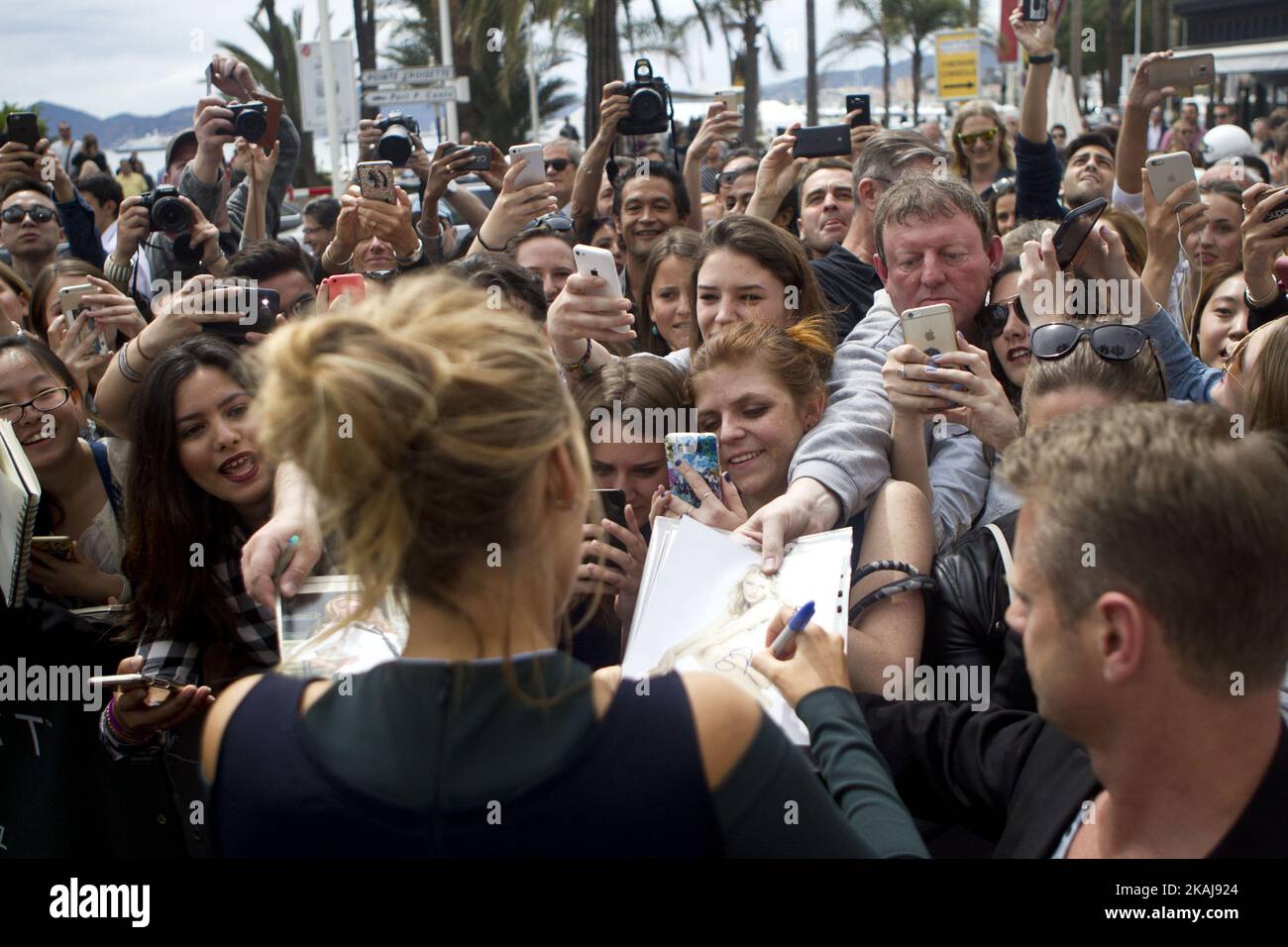 Blake Lively, signs autographs as she exits the Grand Hyatt Cannes 2016 ...