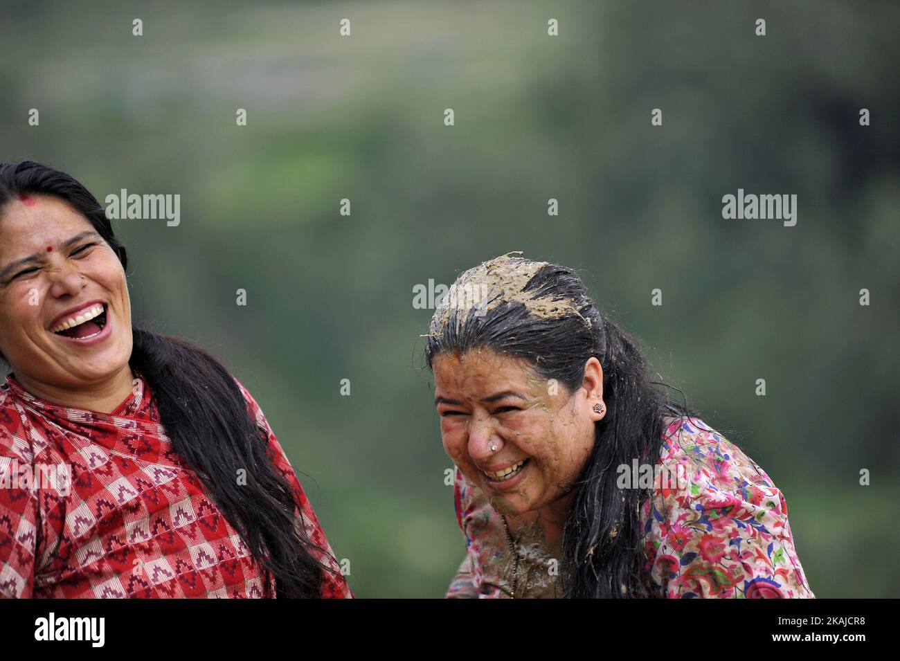 Farmer's smiles as after playing mud with each other during the ...