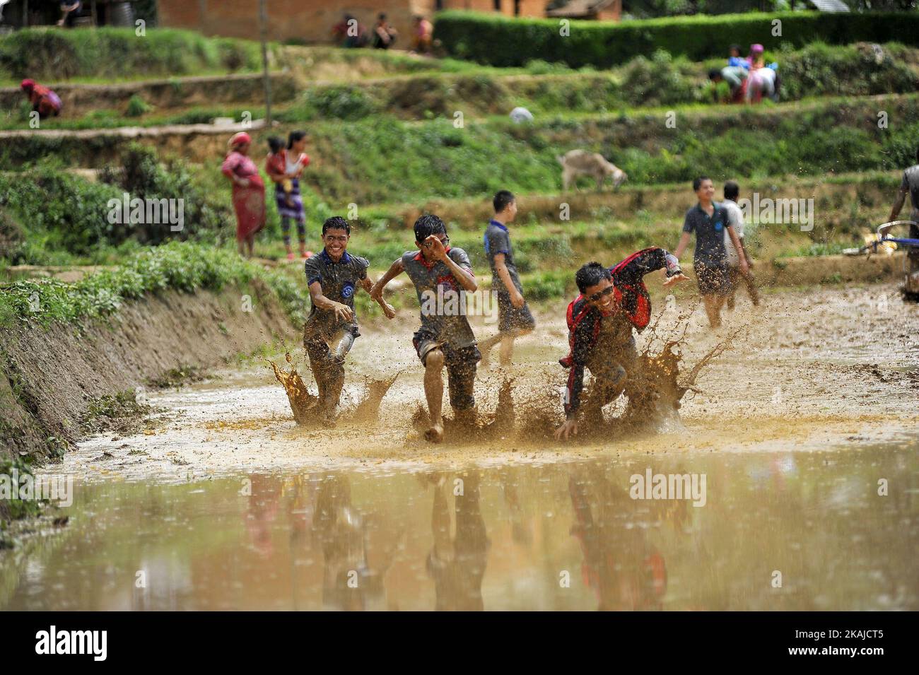 School Kids playing on a Rice Planation ground during the celebration ...