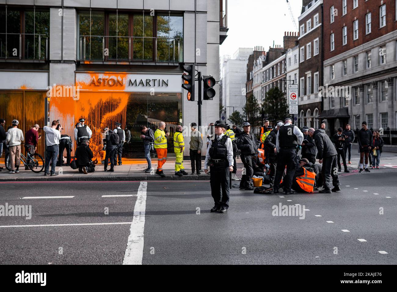 Just Stop Oil protesters glue themselves to Park Lane in Mayfair and ...