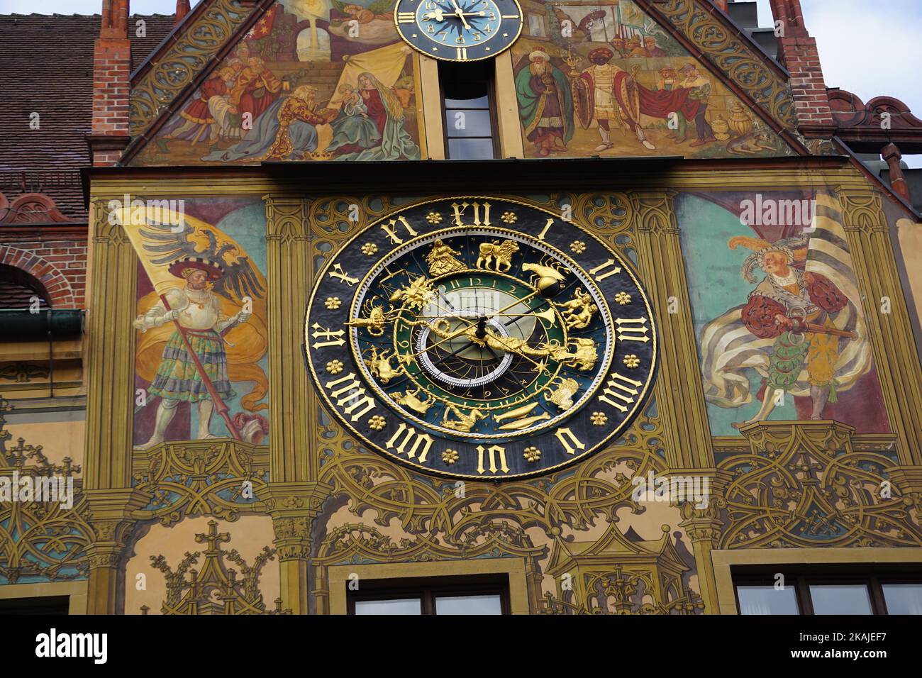 A beautiful view of the clock tower of the Ulm Town Hall in Germany ...