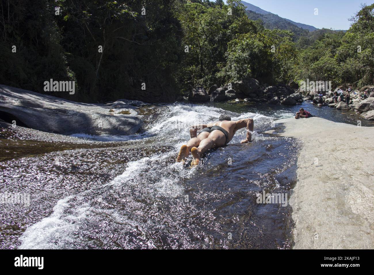 View of Escorrega Waterfall. The Itatiaia National Park is located on the border between Rio de ...