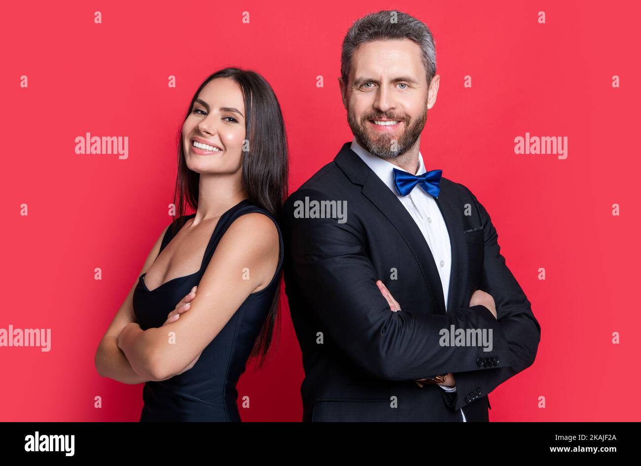 studio shot of glad formal tuxedo couple. elegant couple wear formal ...