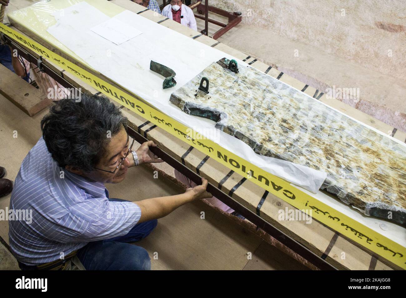 Archeologist look at parts of the second solar boat of Pharaoh Khufu on ...