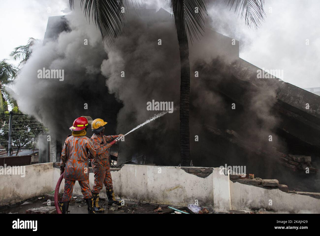 Firefighters are working to put out a fire at a packaging factory in ...