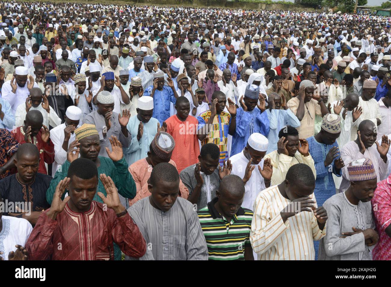 Muslim faithful pray during the Eid-EL-Kabir festival at Ikeja in Lagos ...