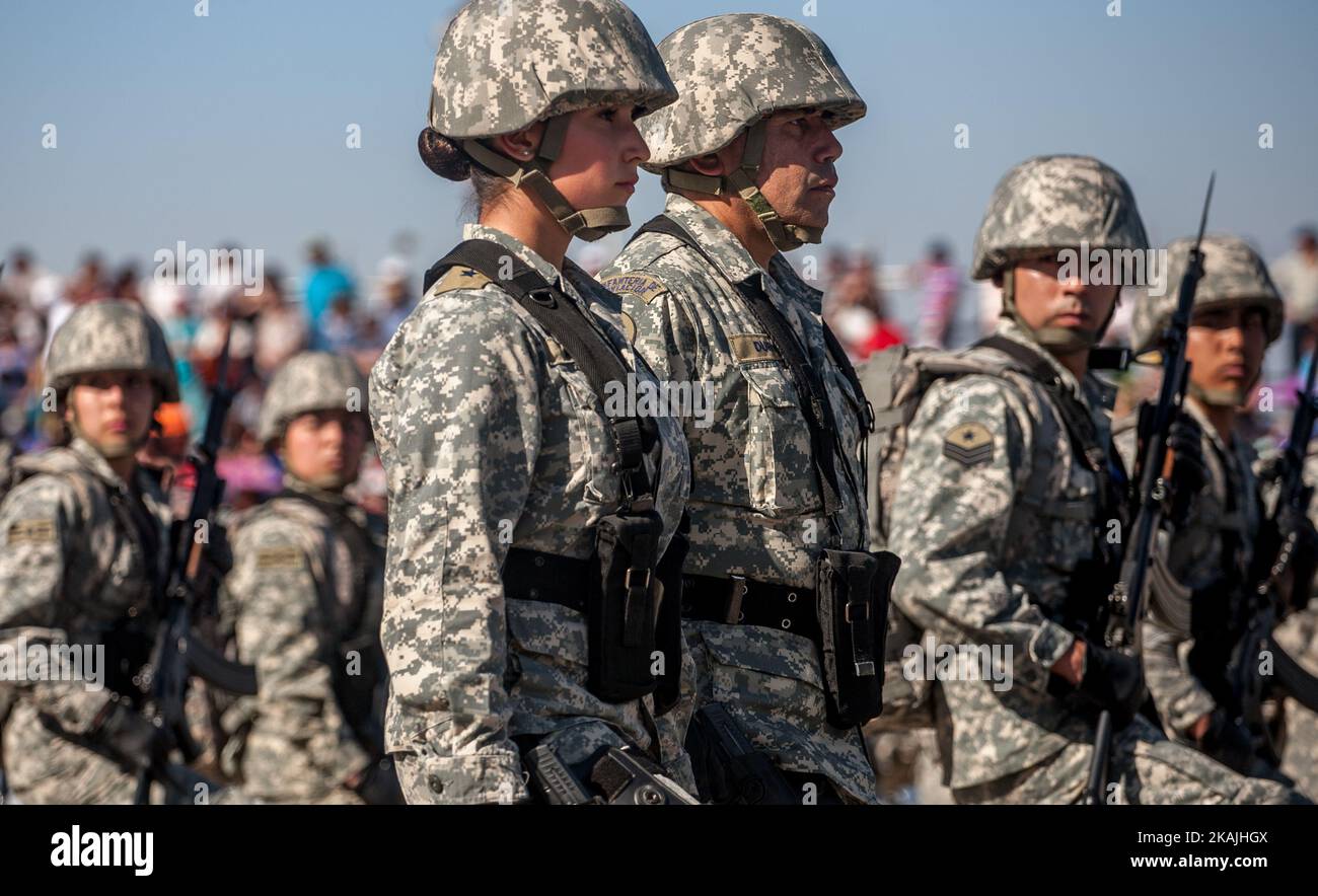 Chilean troops march during the military parade. Chilean President ...