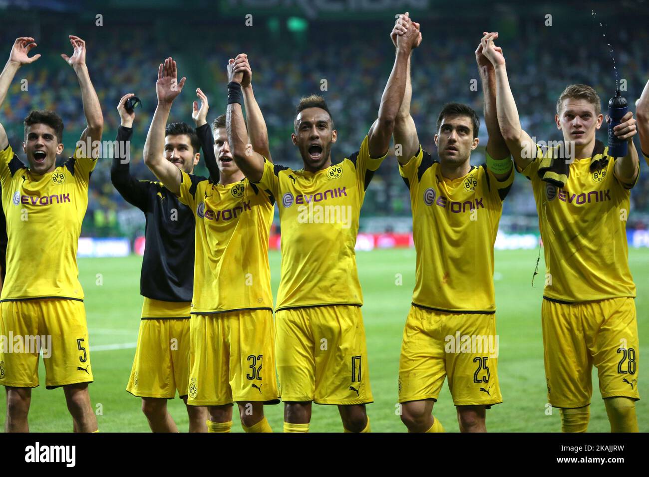 Borussia dortmund players celebrate their victory in the champions ...
