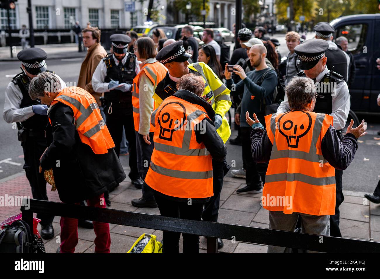 Just Stop Oil protesters glue themselves to Park Lane in Mayfair and ...