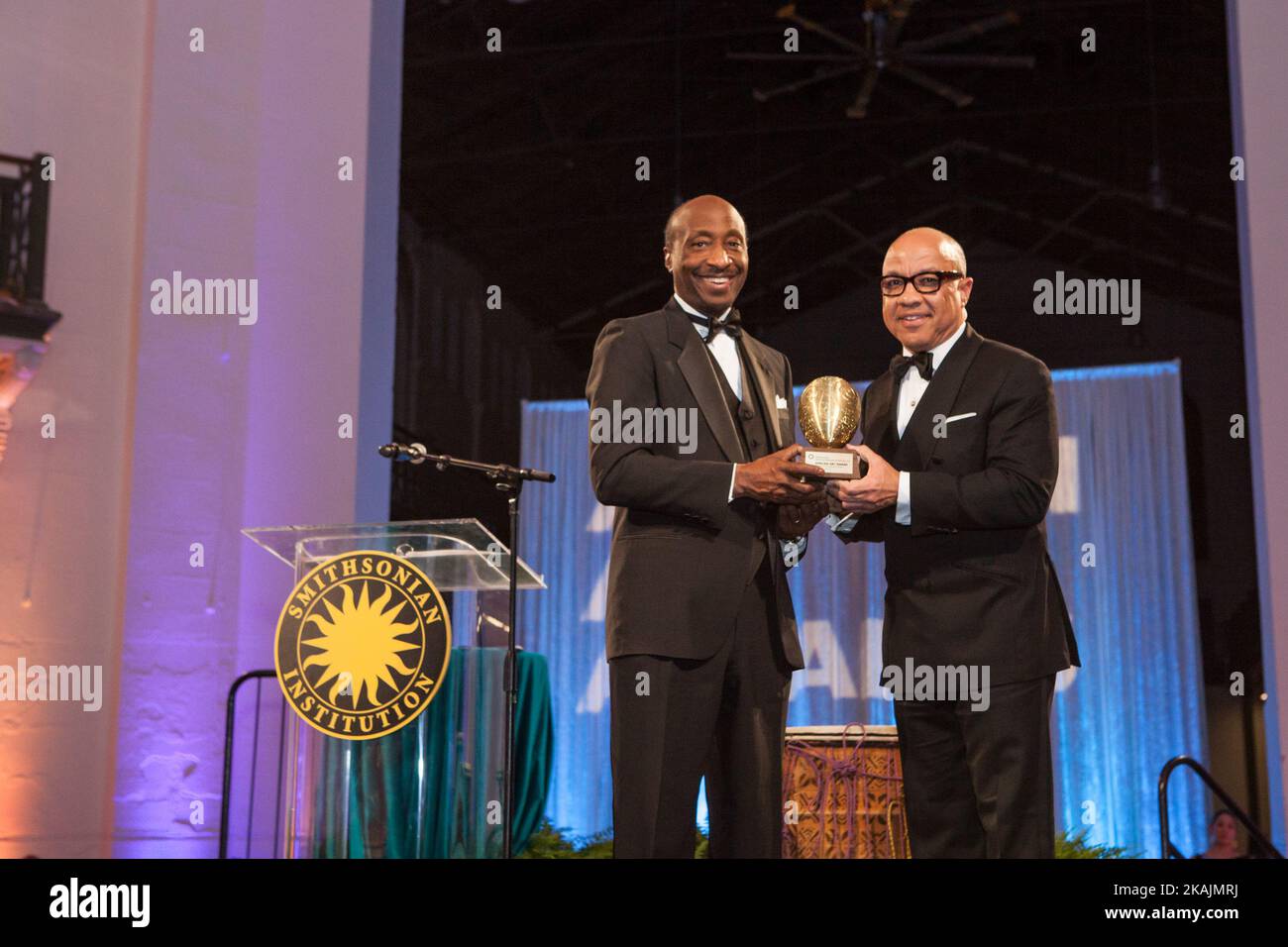 (l-r), Kenneth Frazier (President & CEO of Merck), presents the African ...