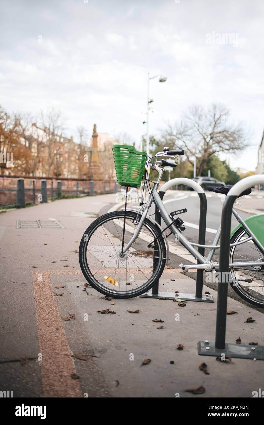 Bike parked in city with security lock - defocused fall atmoshpere in ...