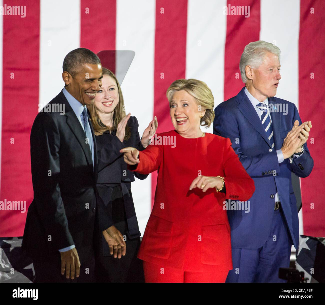U.S. Presidential hopeful Hillary Clinton, walks the stage greeting the ...