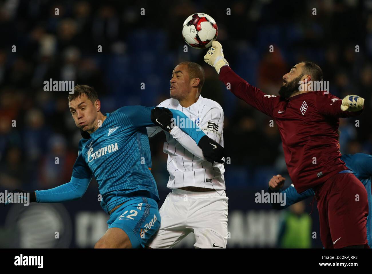 Artem Dzyuba (L) of FC Zenit St. Petersburg and Jose Ferreira Nadson (C ...