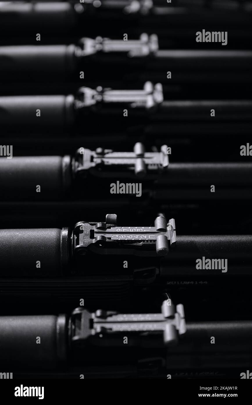 Stocks of weapons. New automatic rifles in a box. The sighting bar of ...