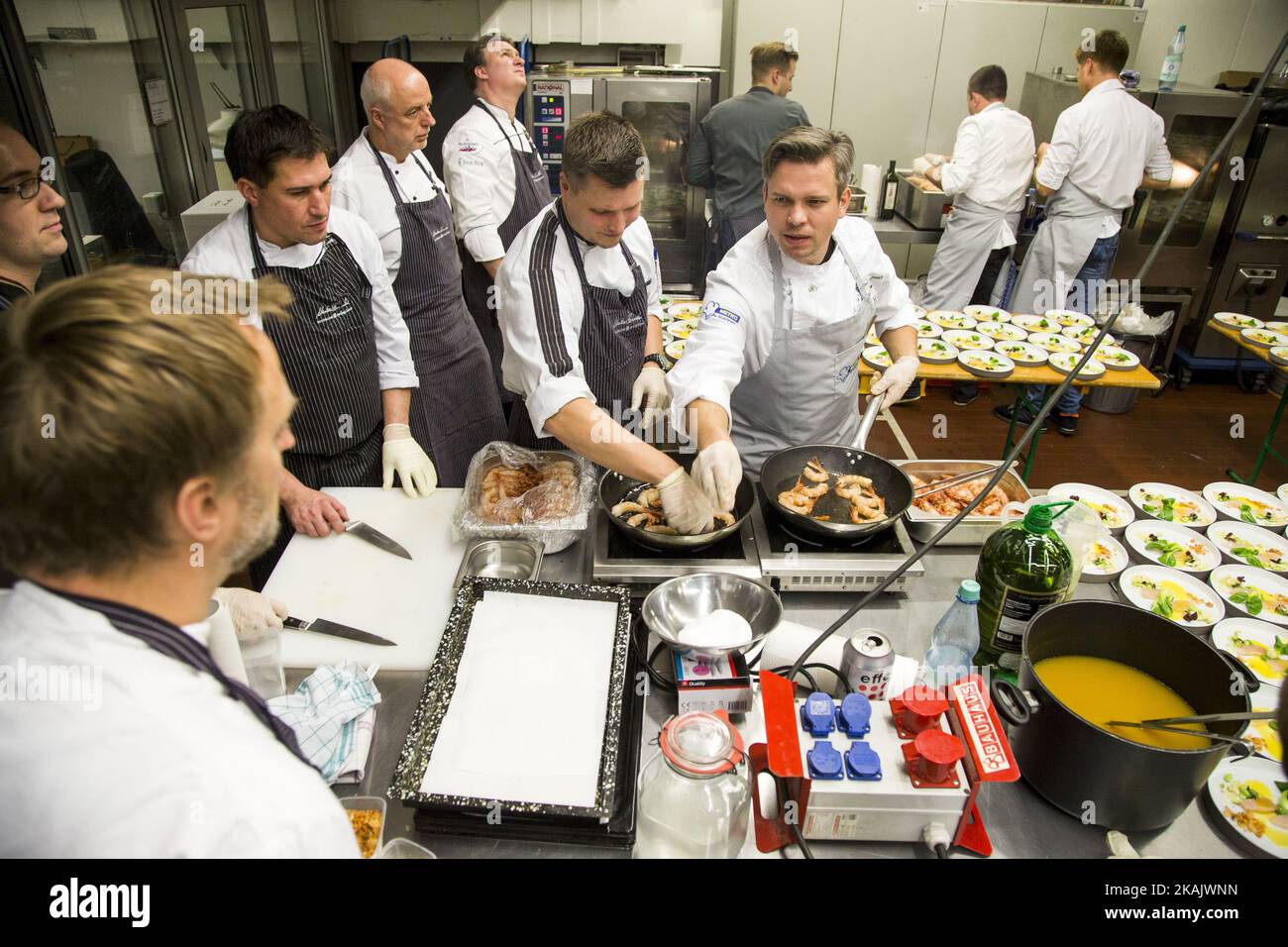 Chefs are pictured during the preparation of the gala dinner organized ...