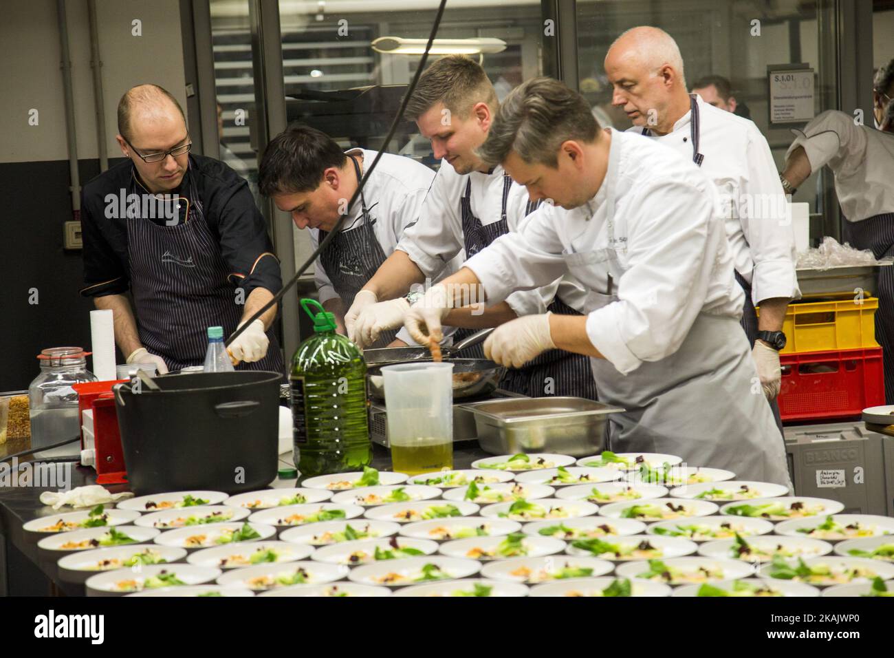Chefs are pictured during the preparation of the gala dinner organized ...